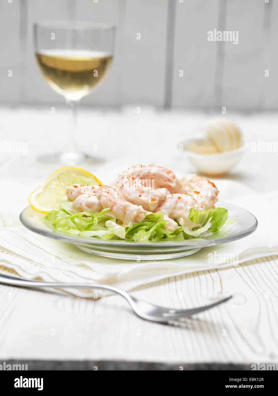 King prawn cocktail with paprika, slice lemon and lettuce salad Stock ...