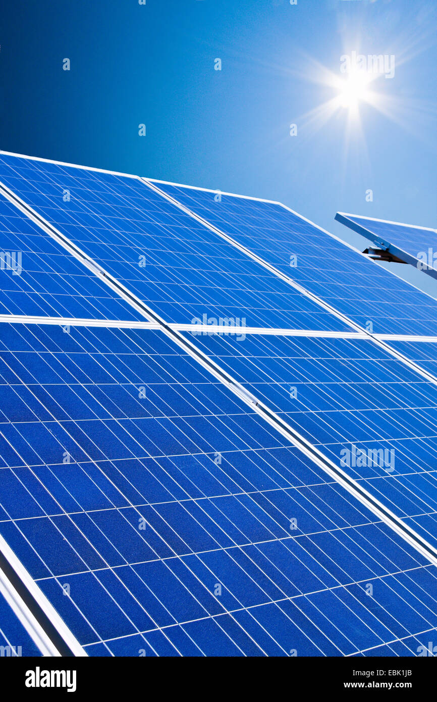 solar plant against blue sky with clouds Stock Photo - Alamy