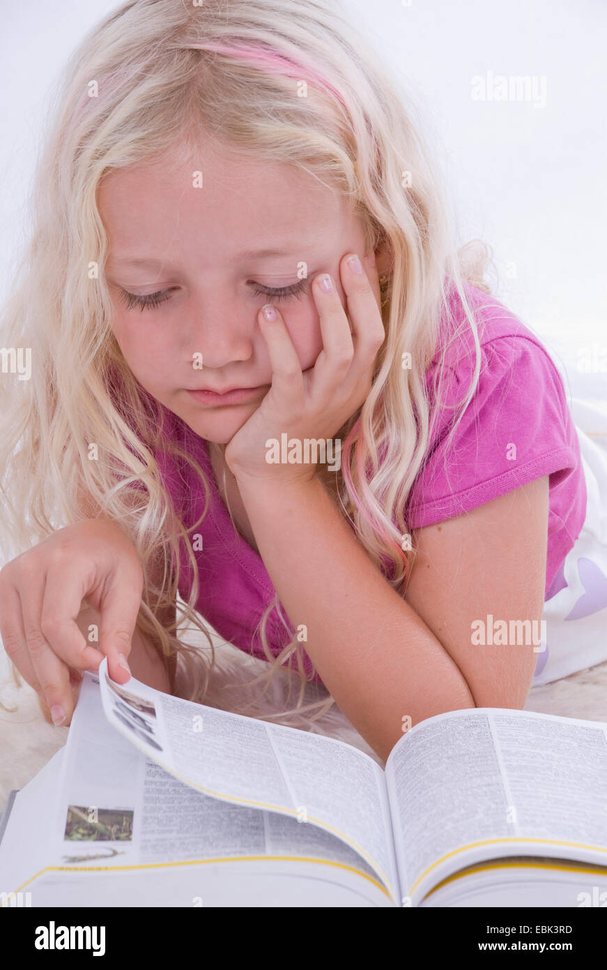 girl reads a book Stock Photo - Alamy