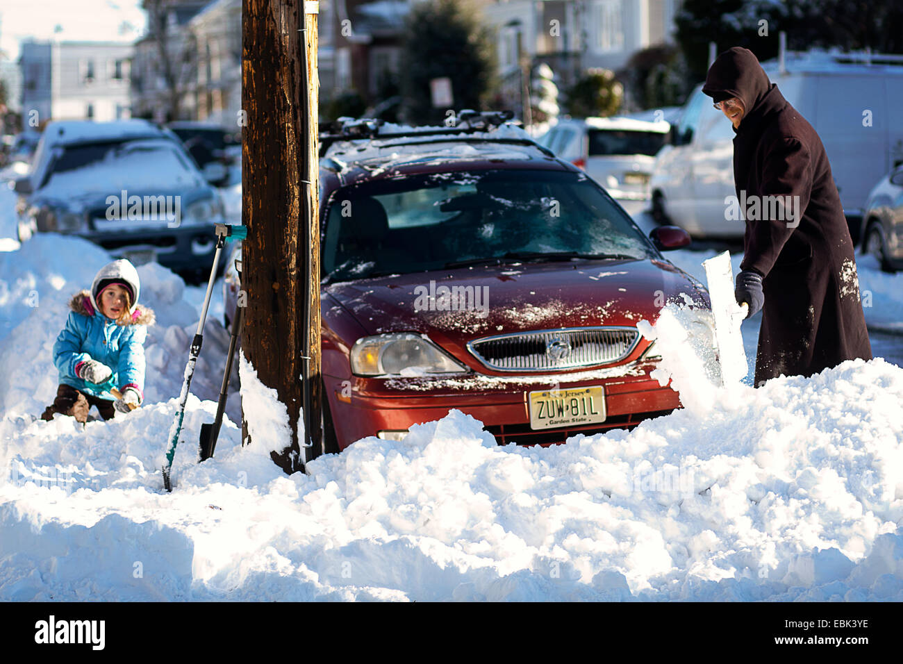 Woman snow car digging hi-res stock photography and images - Alamy