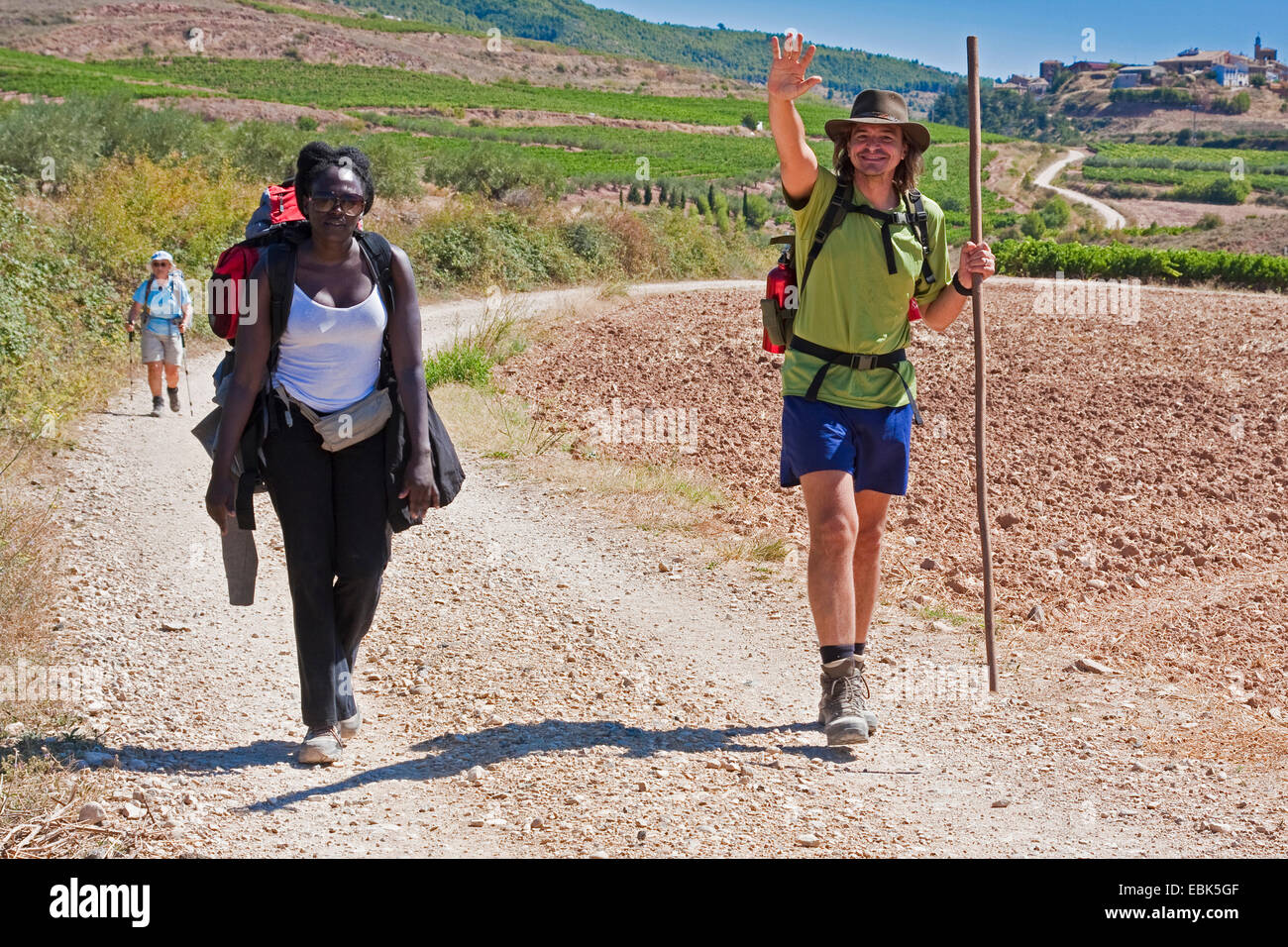 two pilgrims on the way from Cirauqui to Estella, Spain, Basque country ...