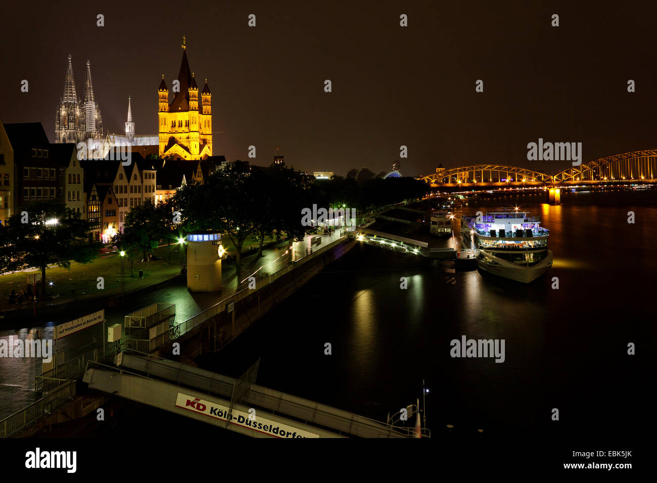 Rhine riverside in Cologne at night, with old city, chuirch Gross St ...