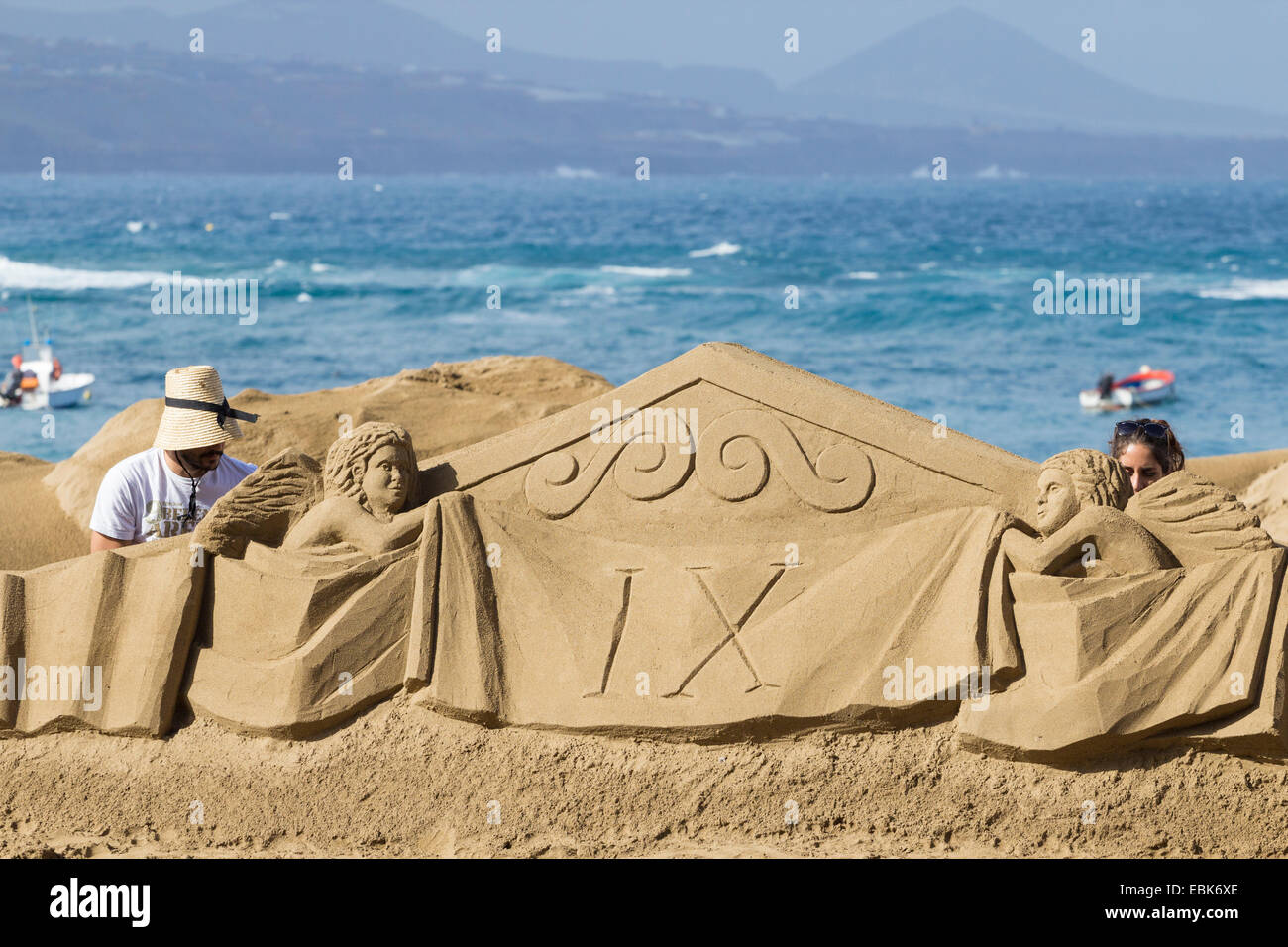 Sculptors working on sand nativity scene on Las Canteras beach in Las ...