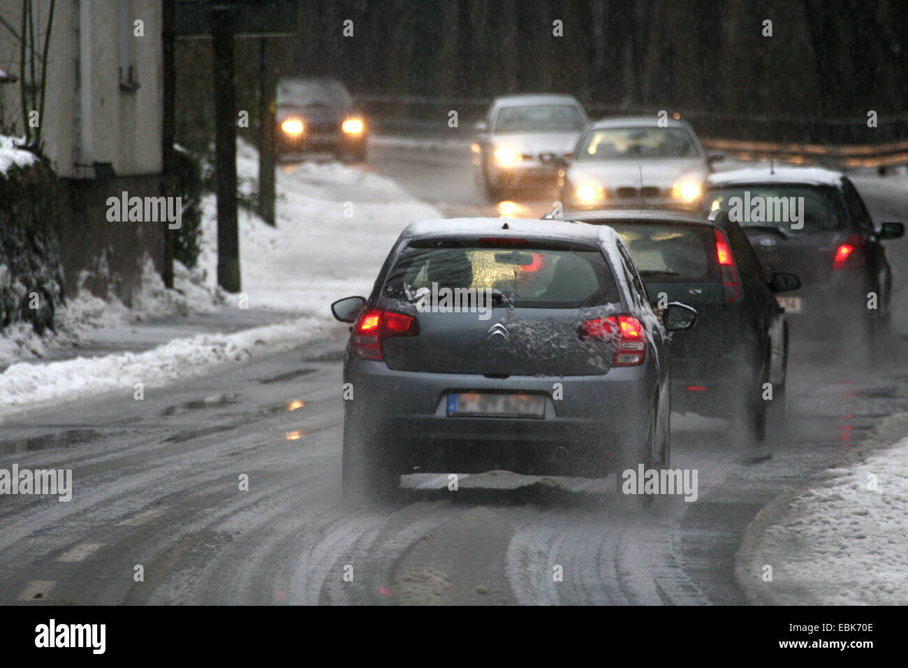 Snow slush on busy road hi-res stock photography and images - Alamy