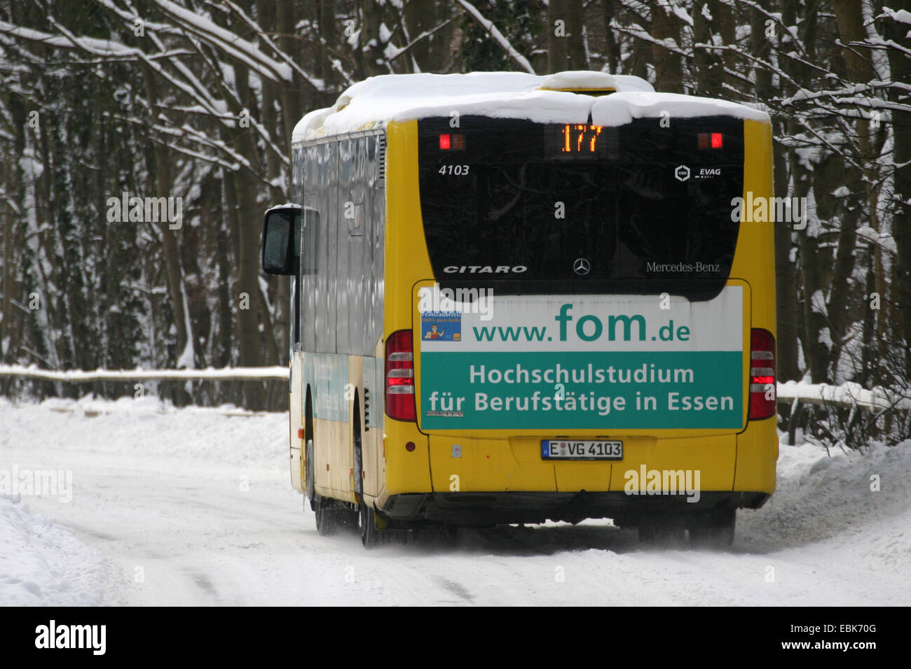 Bus line on snowy street hi-res stock photography and images - Alamy