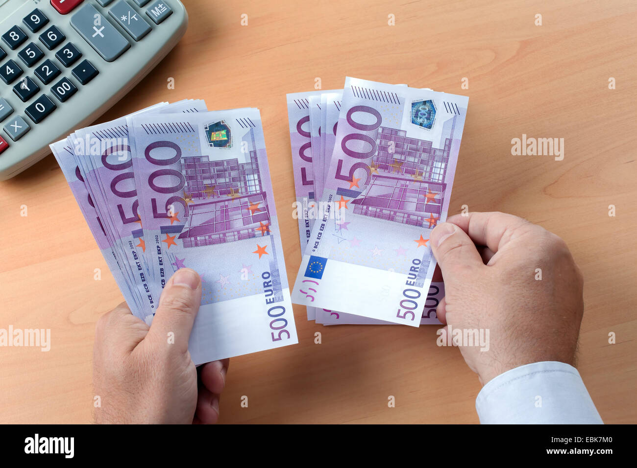 Hand taking euro bills hi-res stock photography and images - Alamy