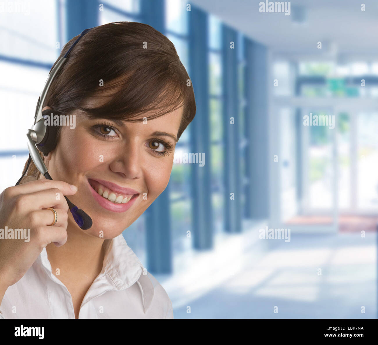 portrait of a receptionist with headset Stock Photo - Alamy