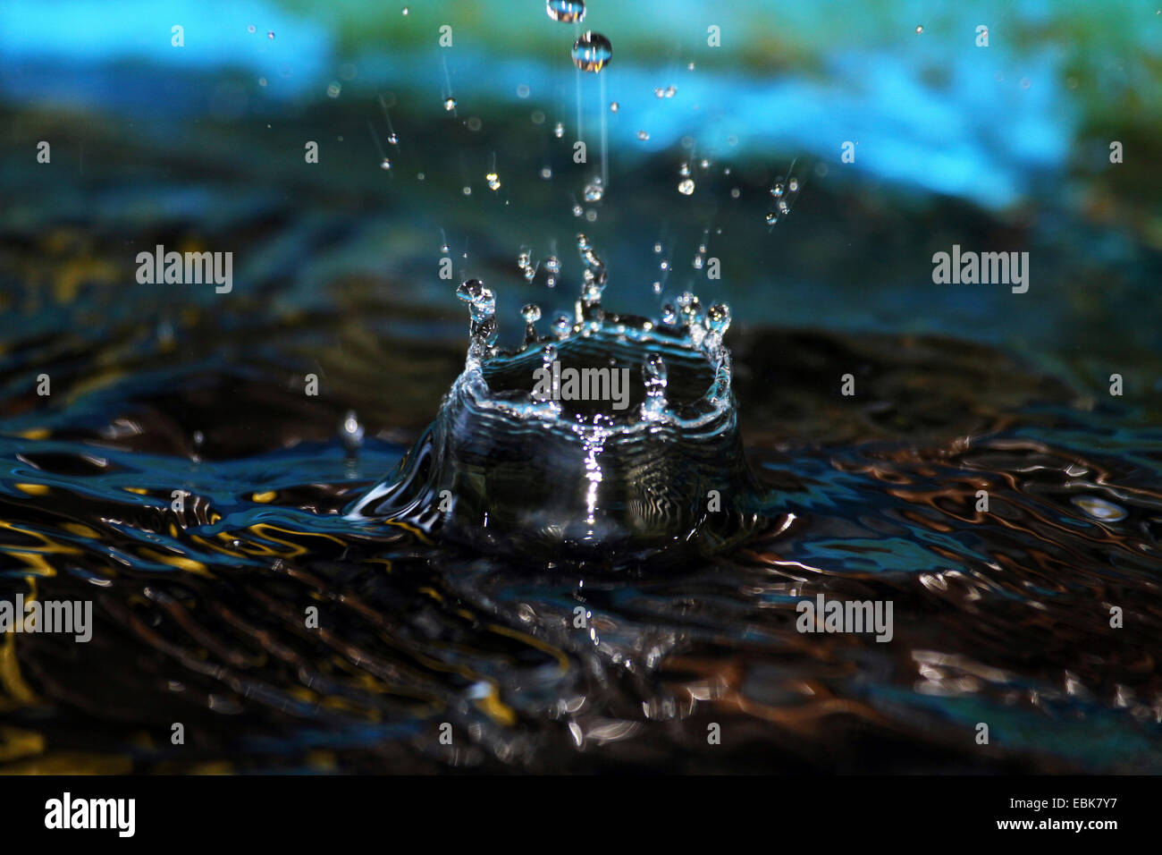 raindrop splashing on watersurface Stock Photo - Alamy