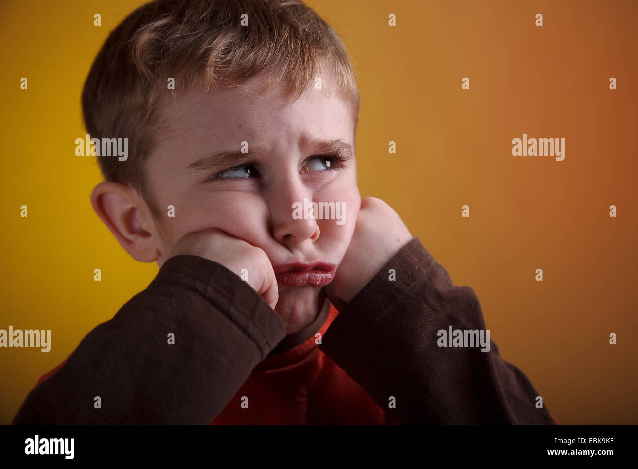 Blond boy sulking hi-res stock photography and images - Alamy