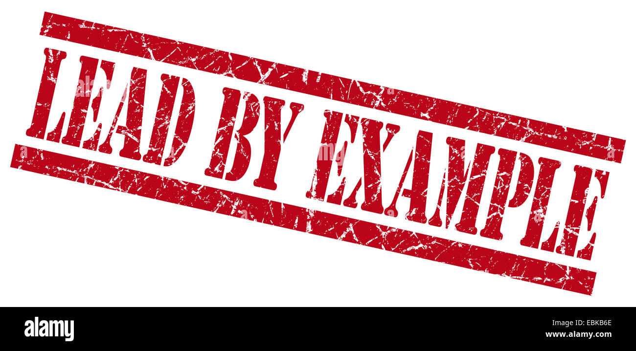 lead by example red grungy stamp on white background Stock Photo - Alamy