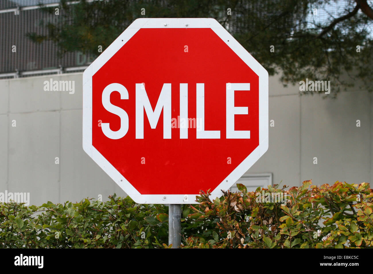 stop sign labeled 'smile' Stock Photo - Alamy