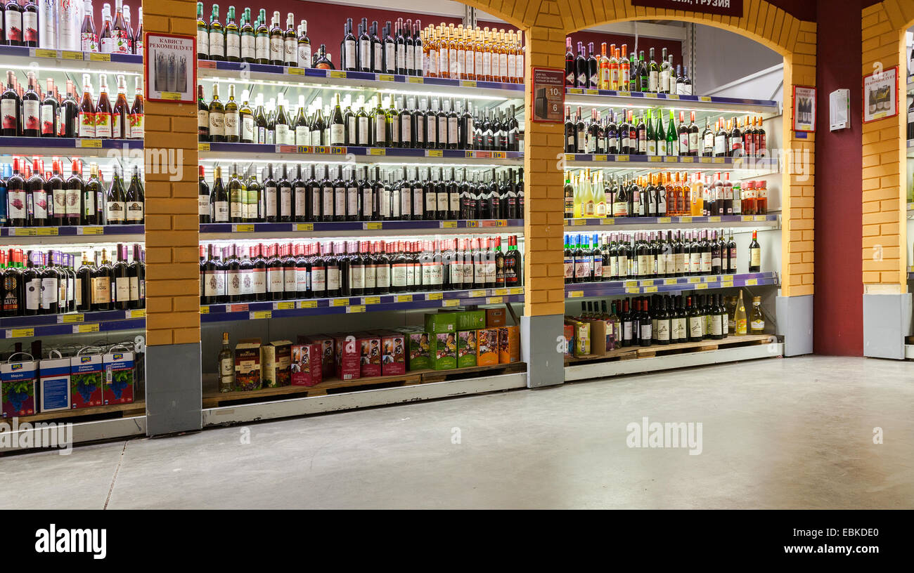 Showcase alcoholic beverages at the hypermarket METRO Stock Photo - Alamy