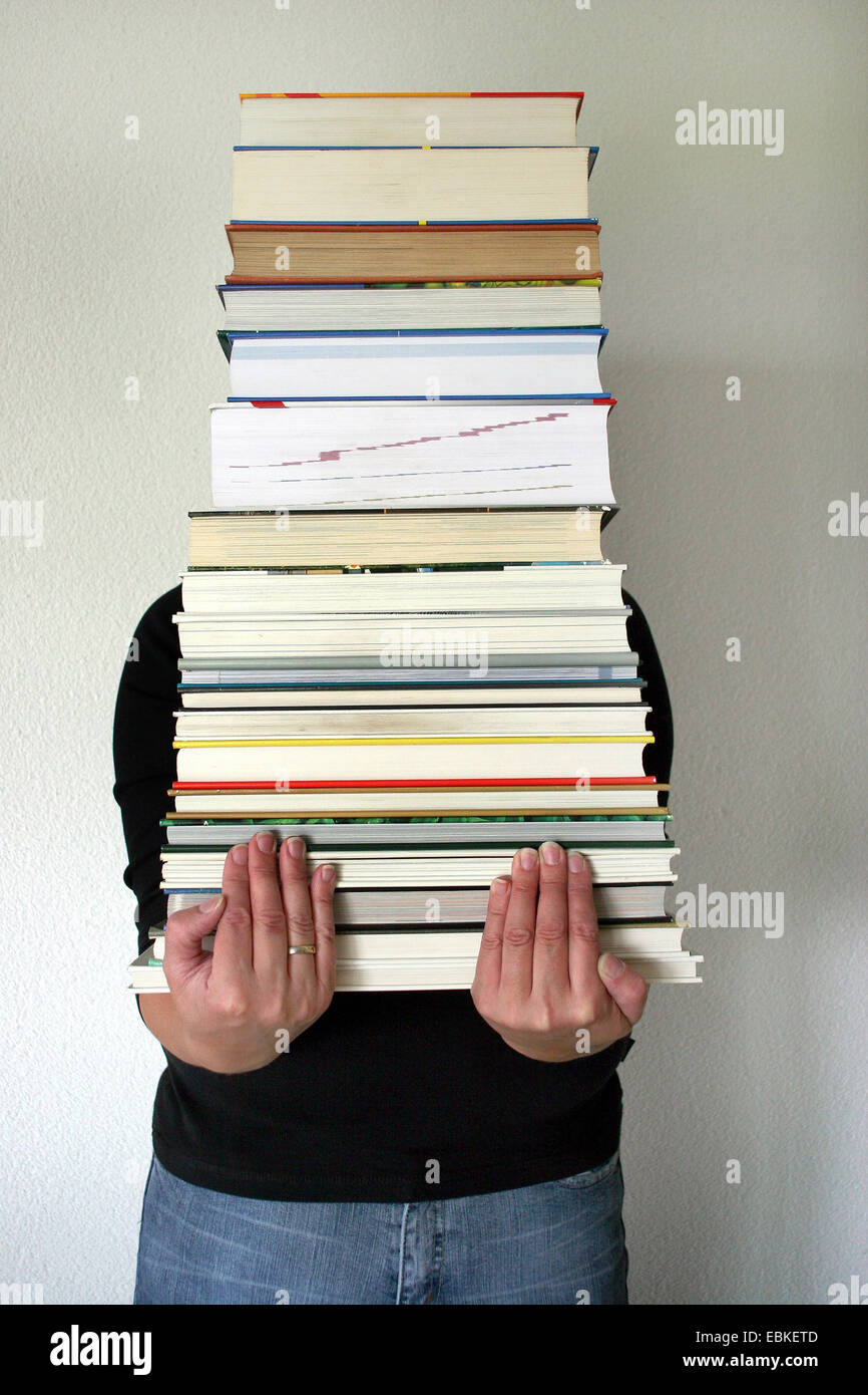 Woman library stacks hi-res stock photography and images - Alamy