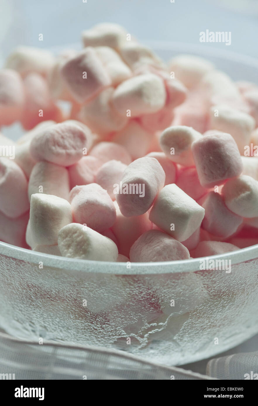 Still life food image of delicate colored marshmallow cubes in a ...