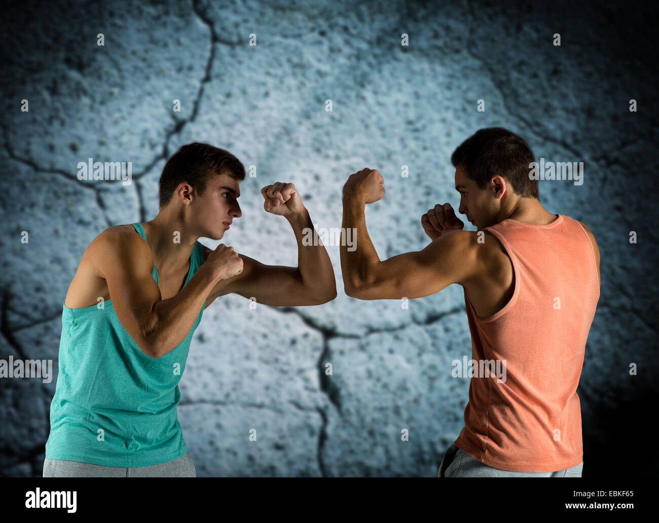 young men fighting hand-to-hand Stock Photo - Alamy