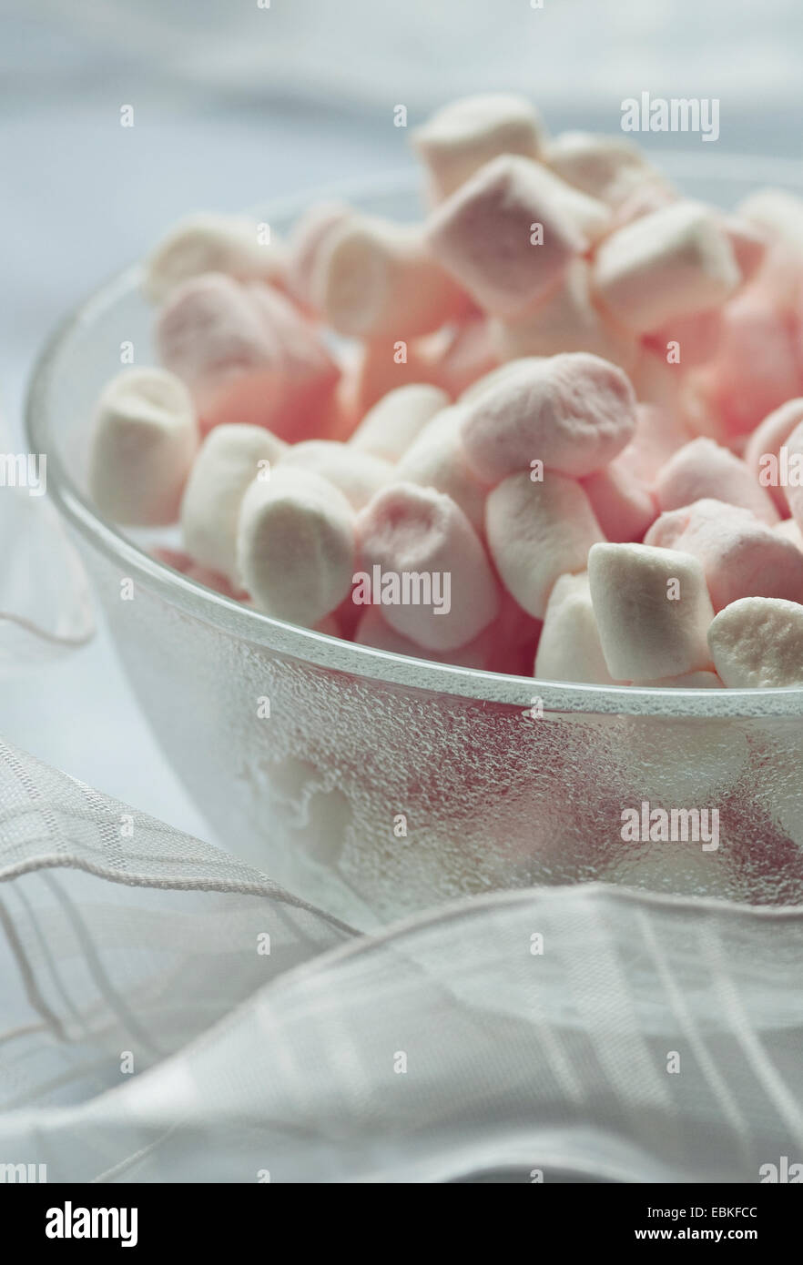 Still life food image of delicate colored marshmallow cubes in a ...