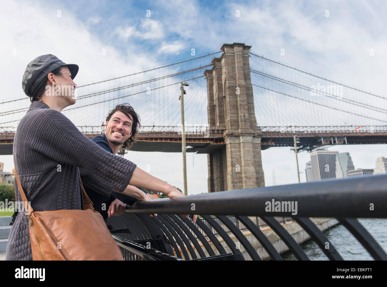Man leaning on bridge railing hi-res stock photography and images - Alamy