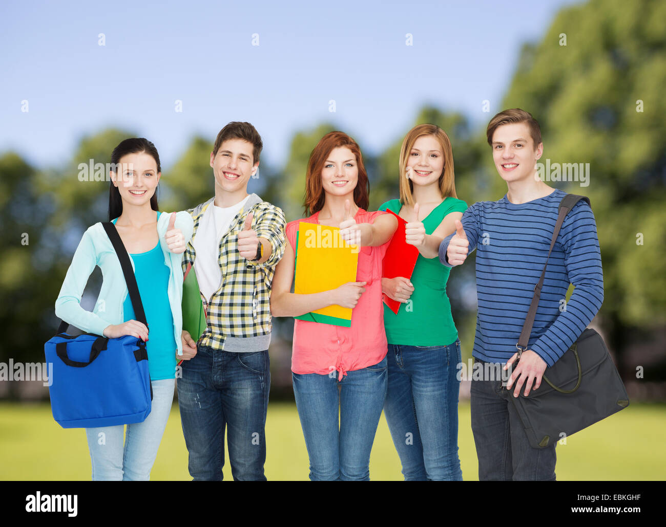 group of smiling students standing Stock Photo - Alamy