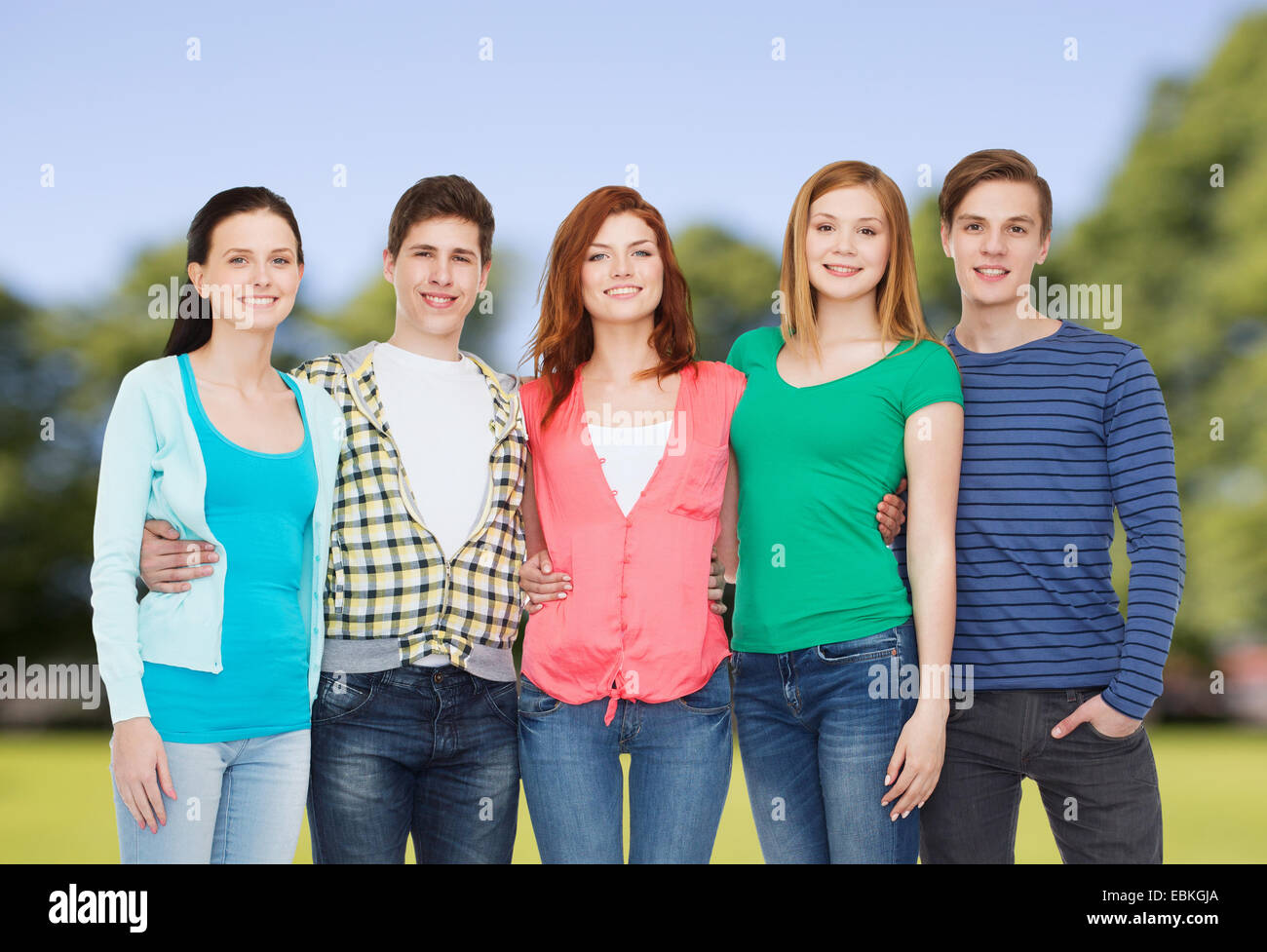 group of smiling students standing Stock Photo - Alamy