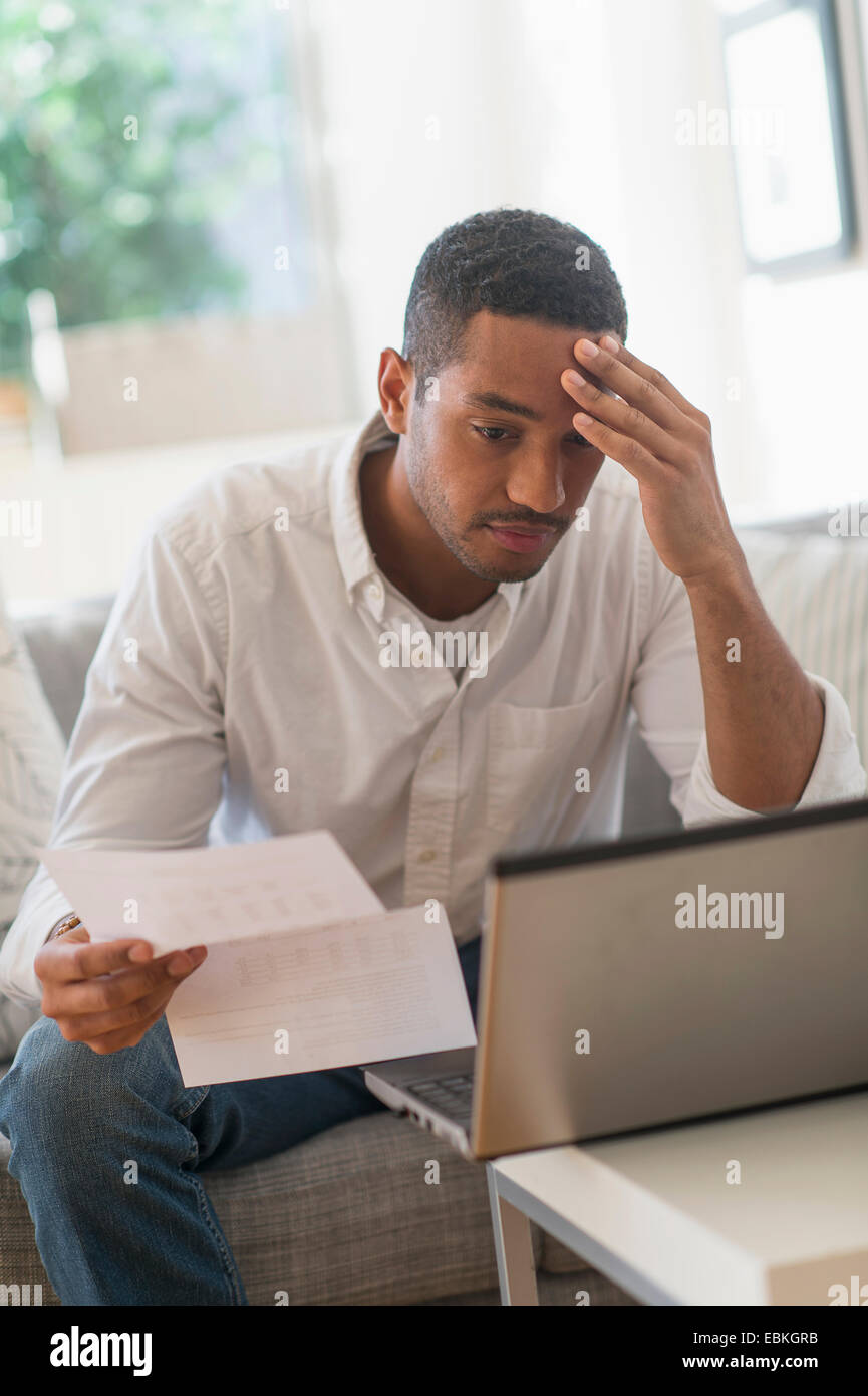 Black man paying hi-res stock photography and images - Alamy
