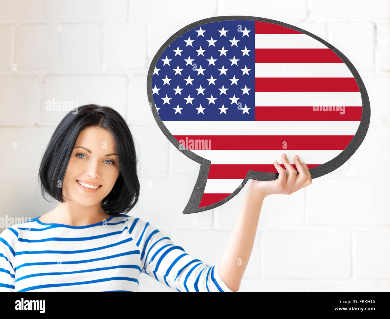 smiling woman with text bubble of american flag Stock Photo - Alamy