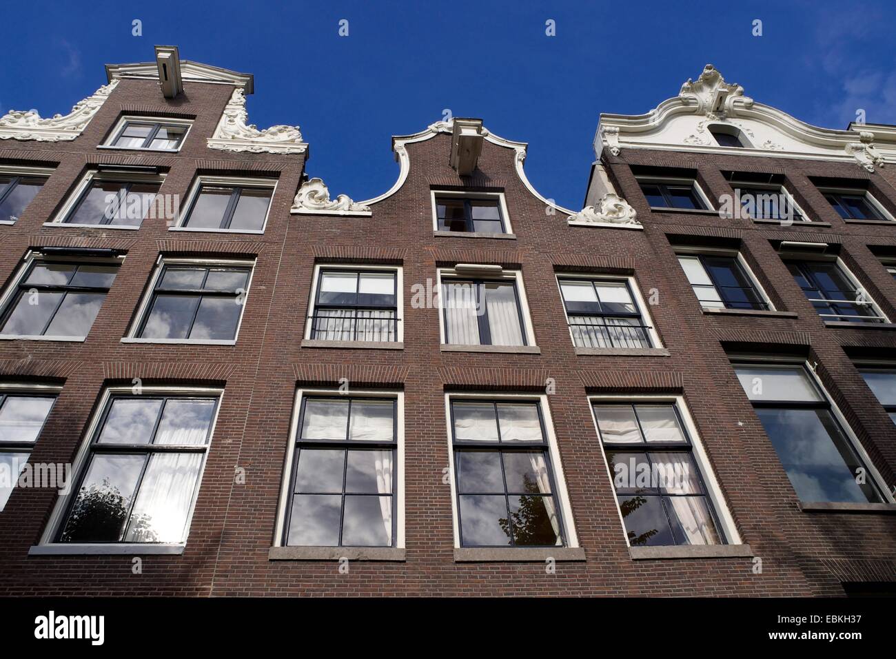 Traditional canal houses reflect Amsterdam's unique architecture in ...