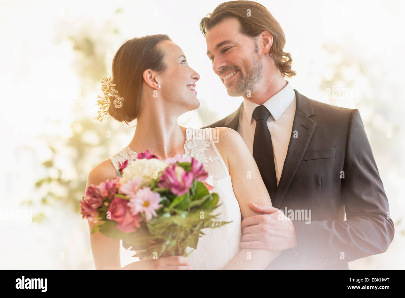 Bride and groom celebrating their wedding Stock Photo - Alamy