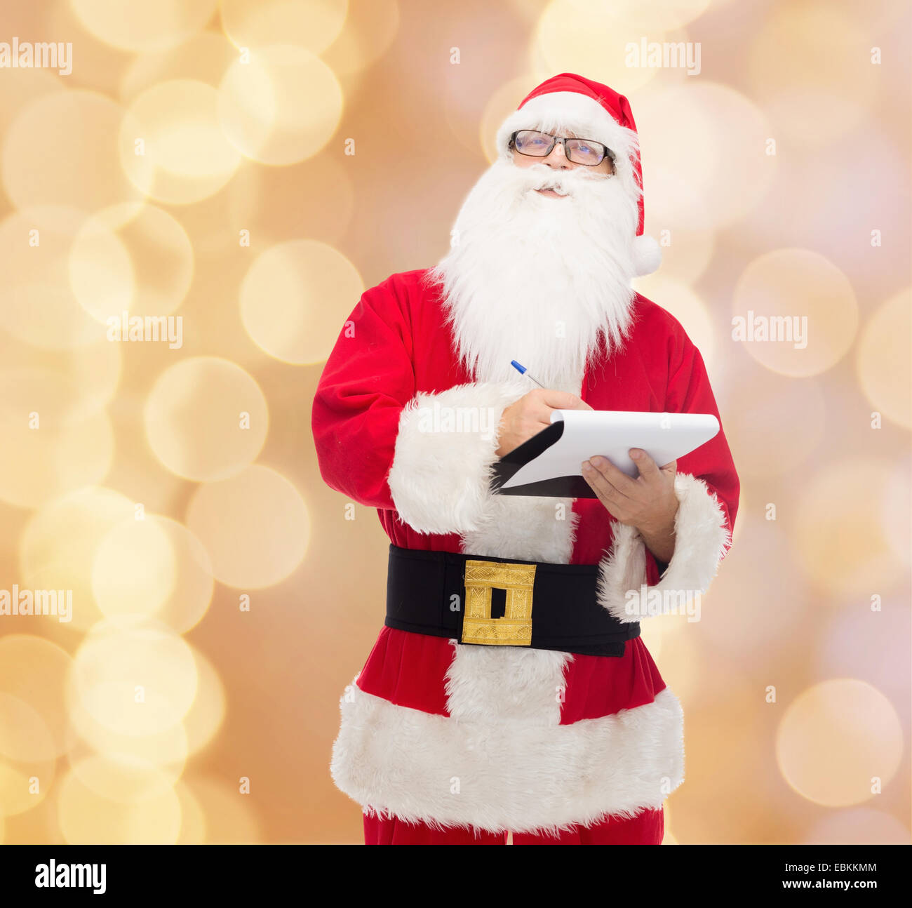 man in costume of santa claus with notepad Stock Photo - Alamy