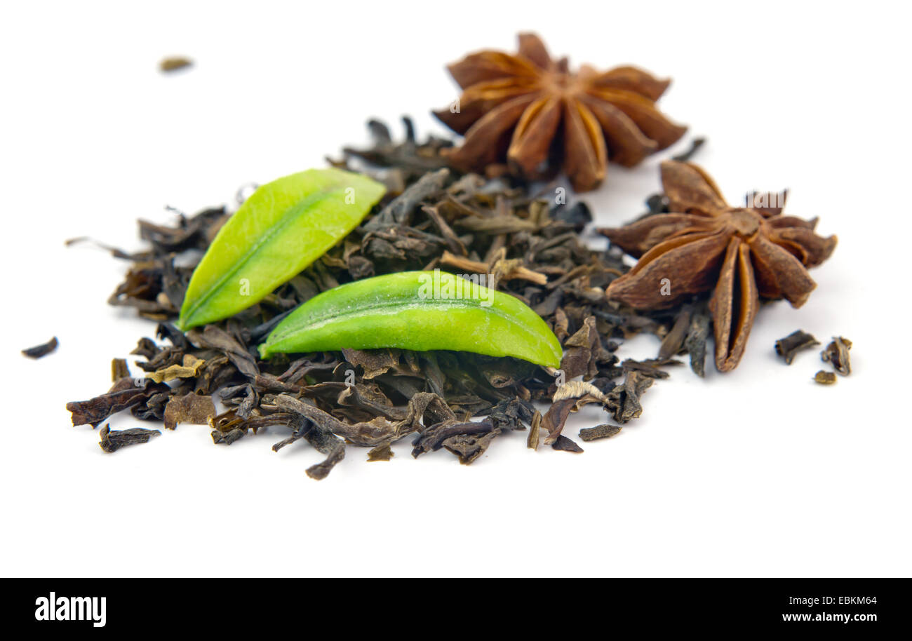 black tea with anise and cloves spices on white background Stock Photo ...