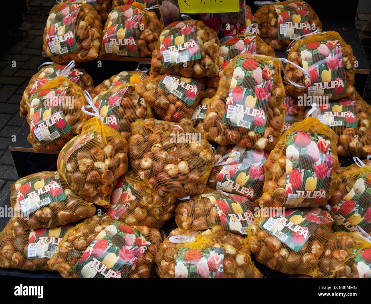 Colorful sacks of tulip bulbs displayed at Bloemenmarkt in Amsterdam ...