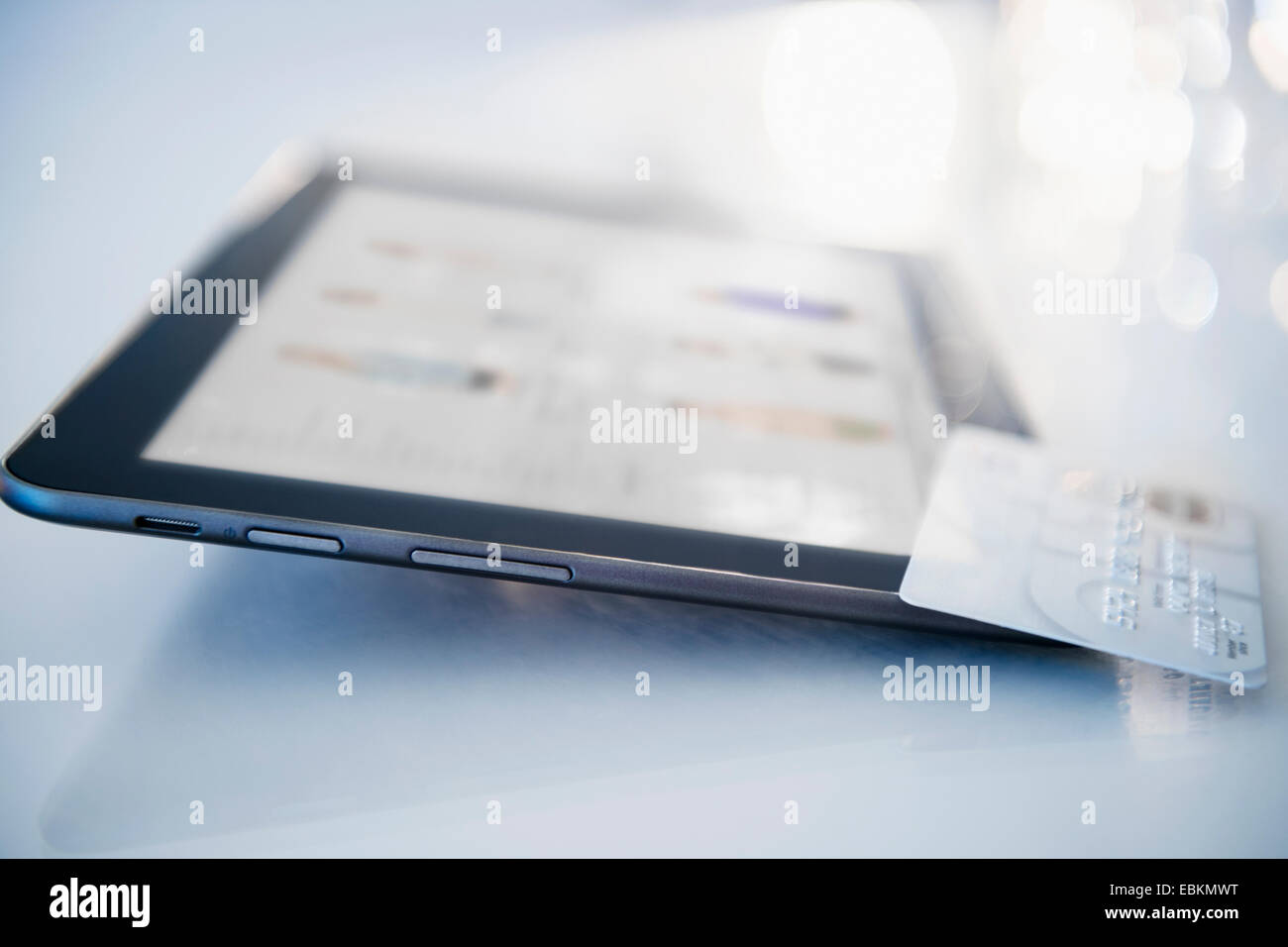 Digital tablet and credit card Stock Photo - Alamy