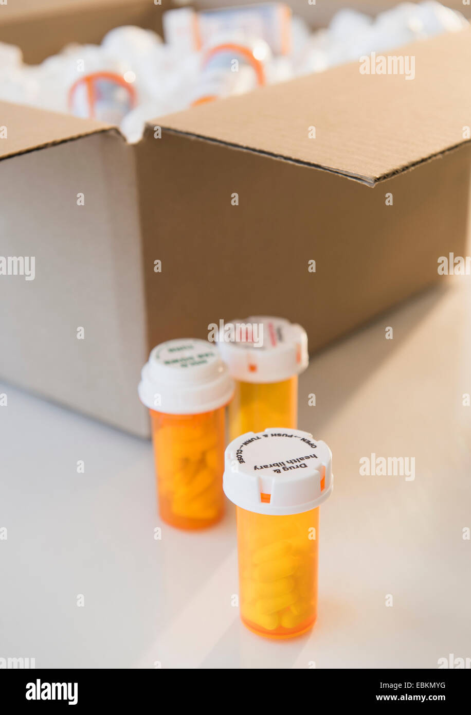 Cardboard box and medicine containers Stock Photo - Alamy