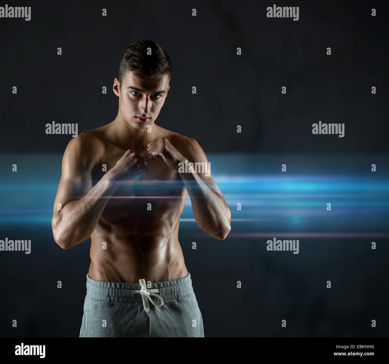 young man in fighting or boxing position Stock Photo - Alamy