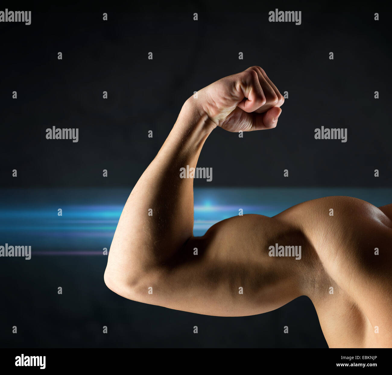close up of young man flexing and showing biceps Stock Photo - Alamy