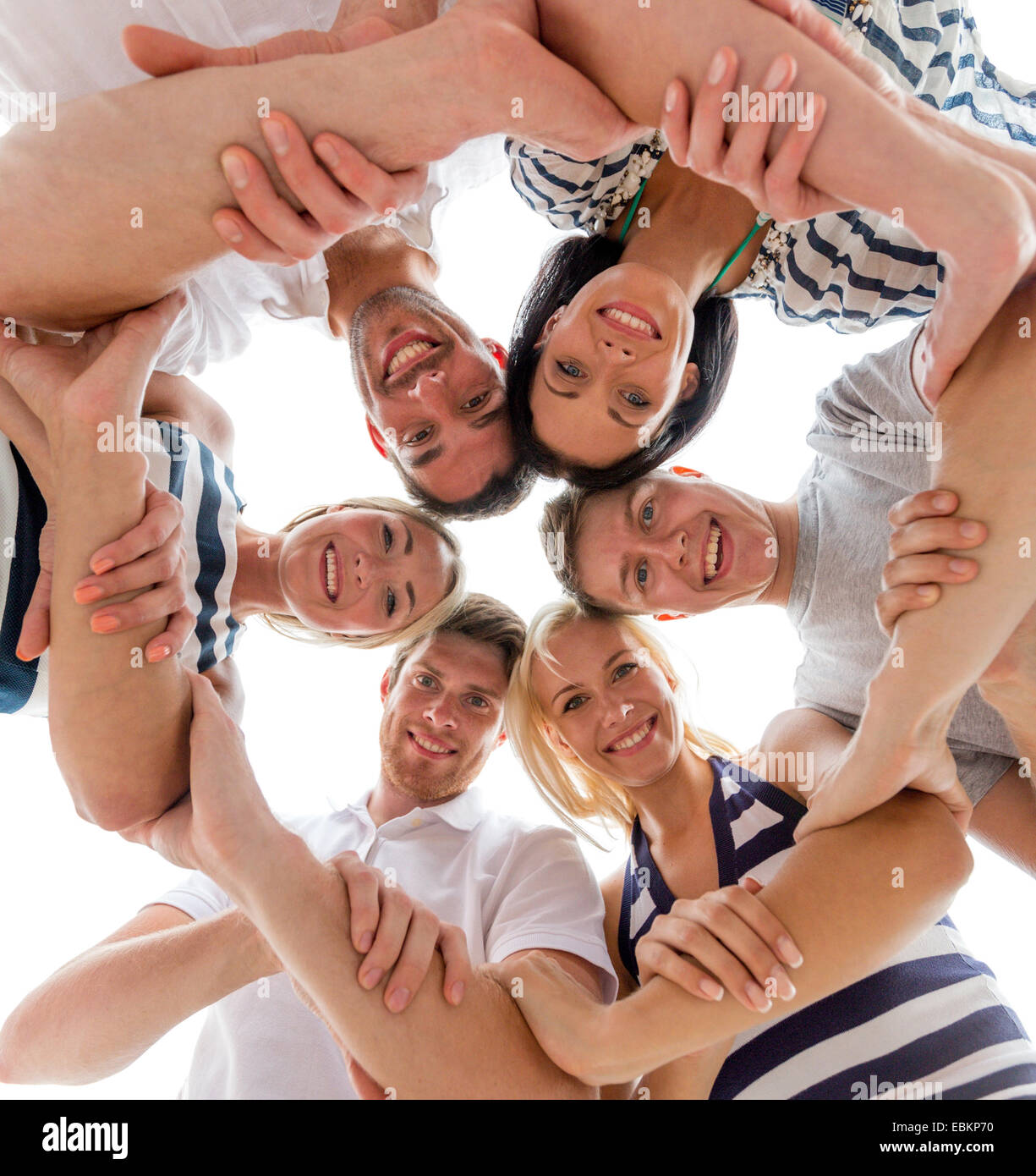 smiling friends in circle Stock Photo - Alamy