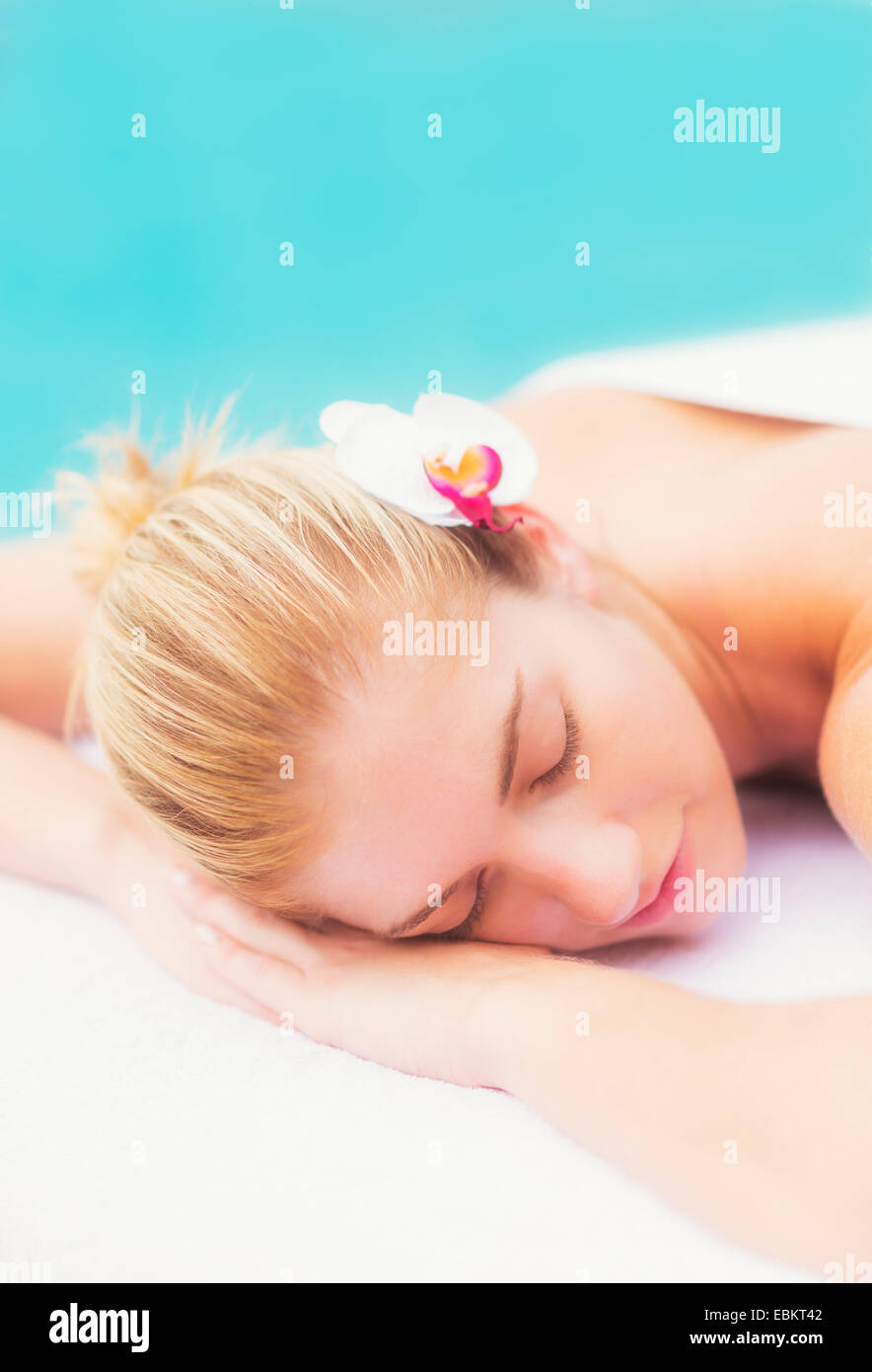 Lying by swimming pool hi-res stock photography and images - Alamy