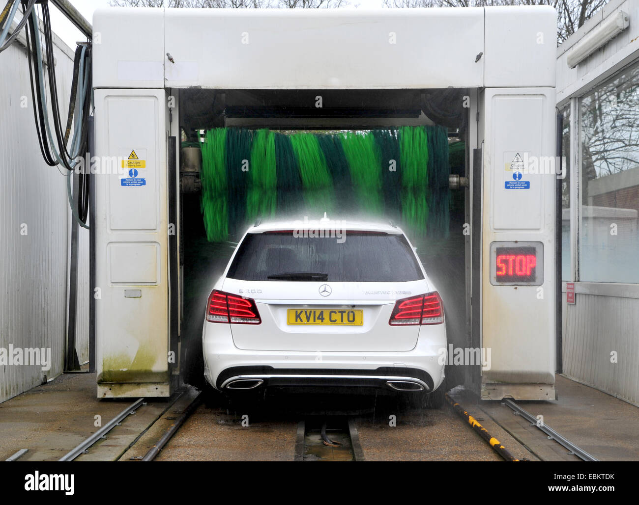 Mercedes E Class car going through a car wash Stock Photo - Alamy