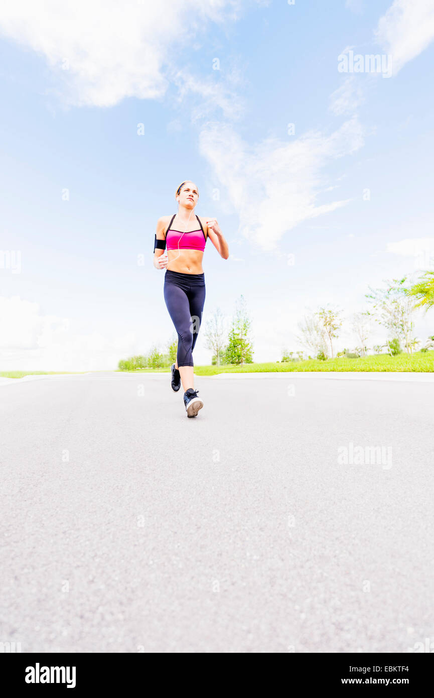 Woman jogging low angle hi-res stock photography and images - Alamy