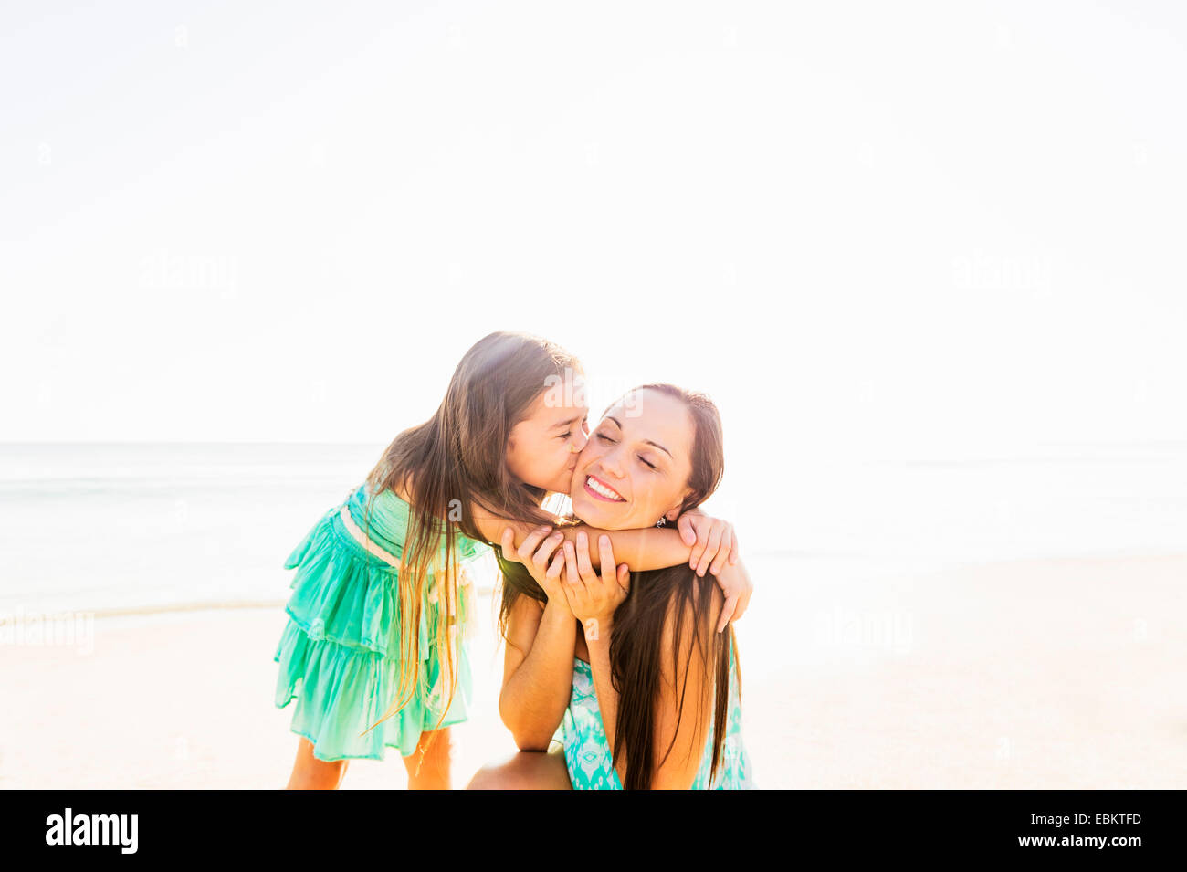 Girls kissing cheek hi-res stock photography and images - Alamy
