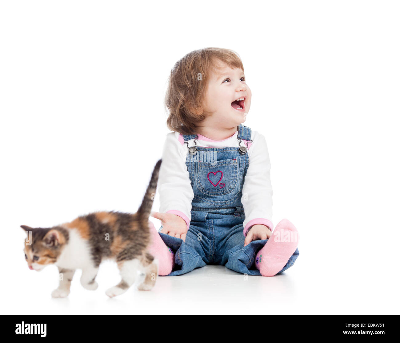 funny happy child playing with cat kitten Stock Photo - Alamy