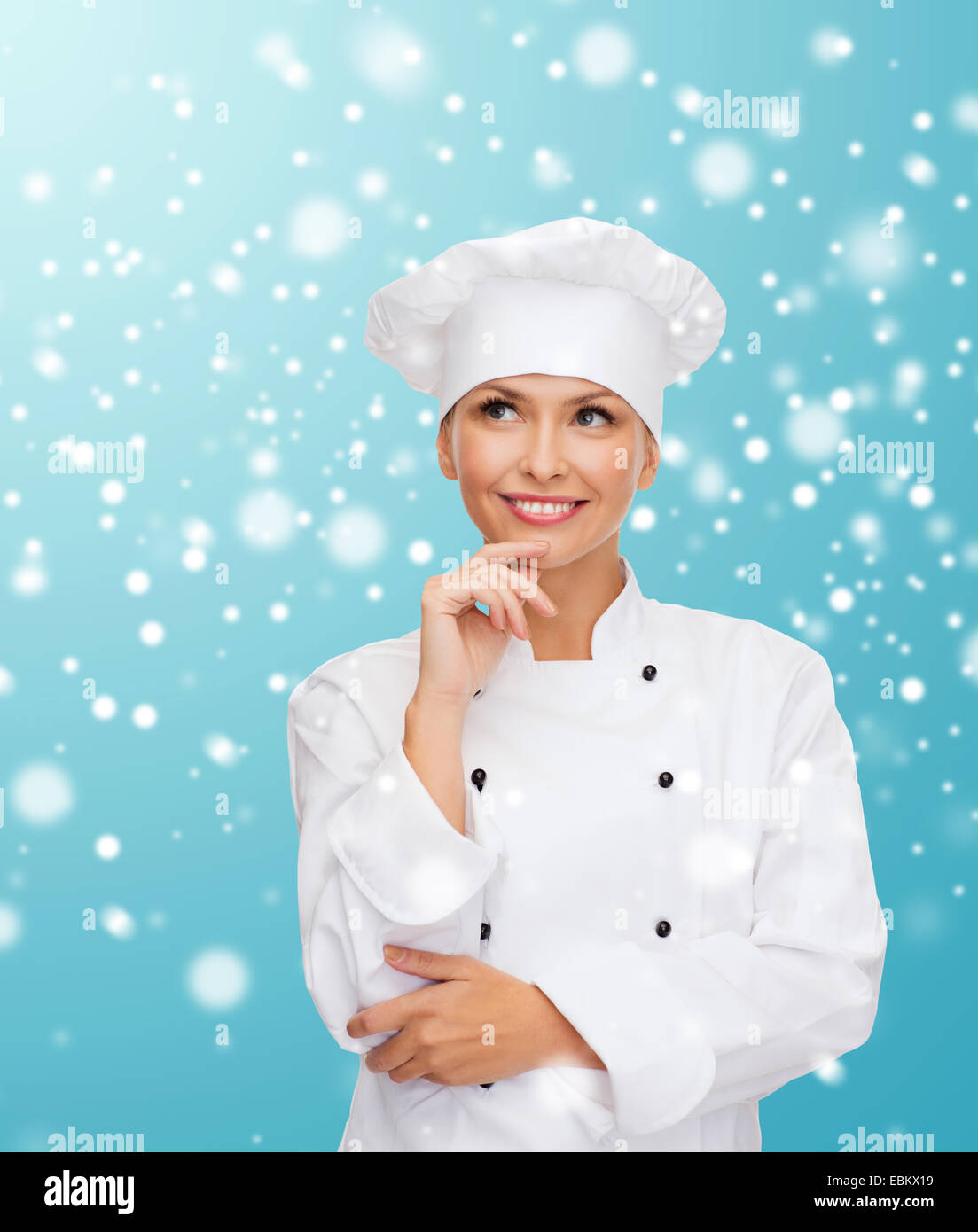 smiling female chef dreaming Stock Photo - Alamy