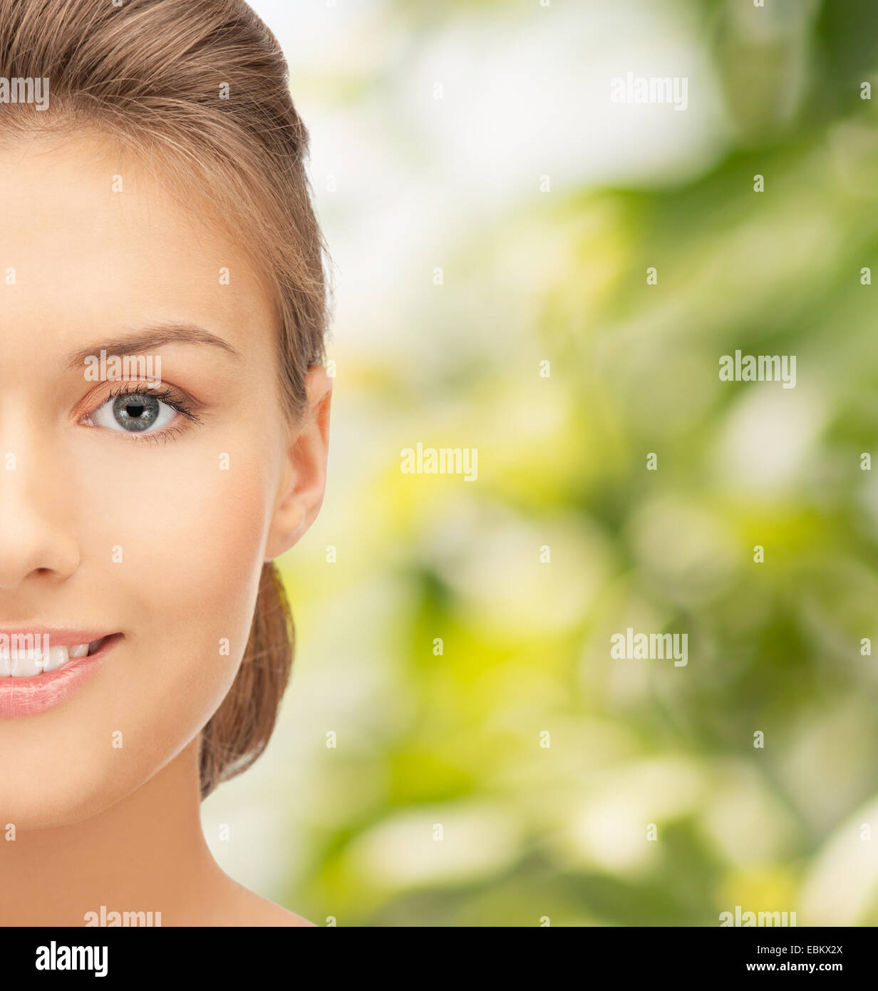 beautiful young woman half face Stock Photo - Alamy