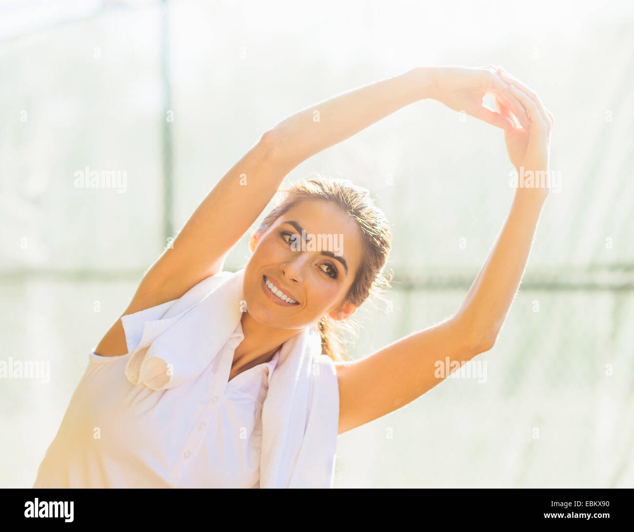 woman from the back with raised hands Stock Photo - Alamy