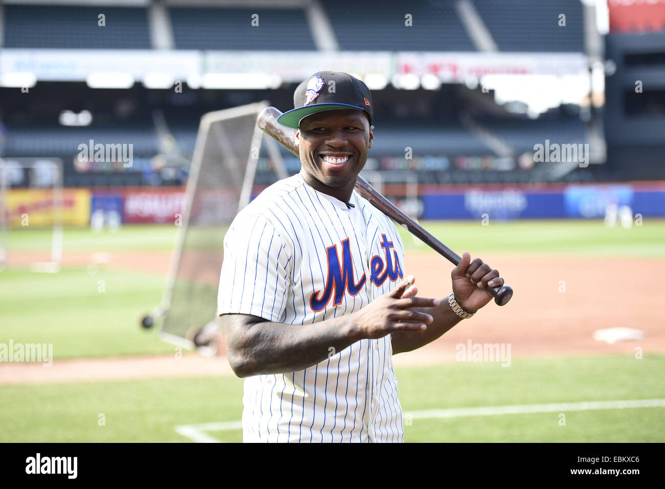 50 Cent poses at Citi Field prior to throwing out the ceremonial first ...