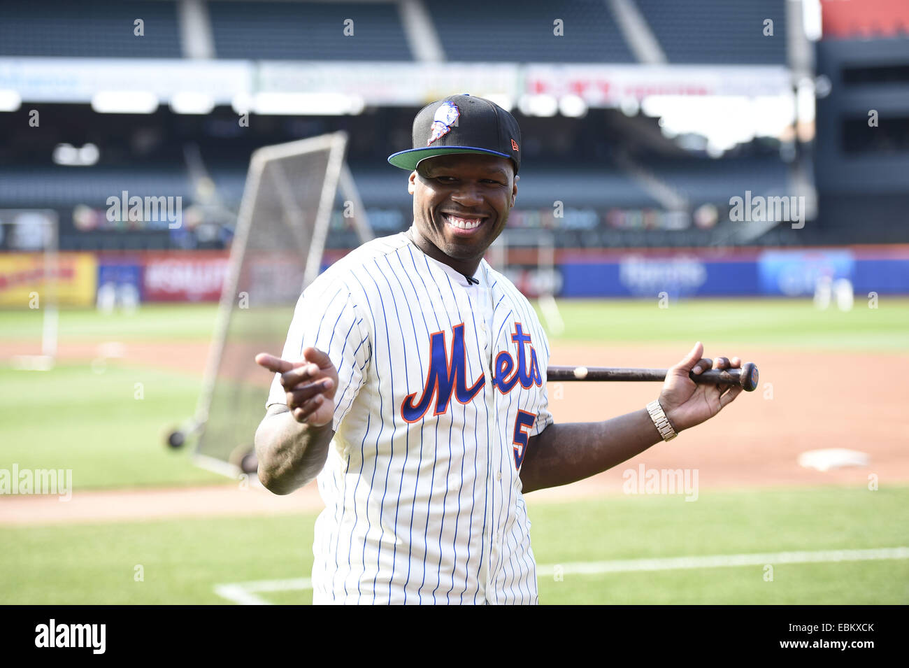 50 Cent poses at Citi Field prior to throwing out the ceremonial first ...