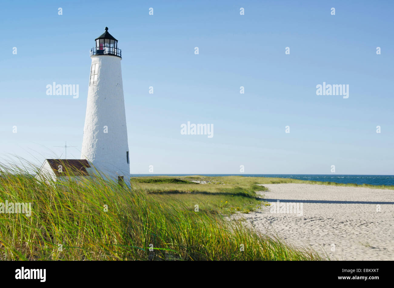 USA, Massachusetts, Nantucket, Great Point Lighthouse on overgrown ...