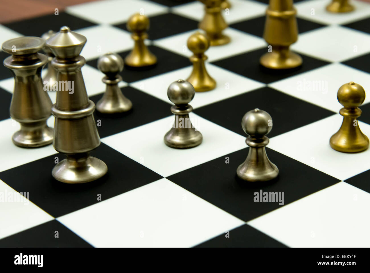 Classic chess game - pieces in play on chessboard Stock Photo - Alamy