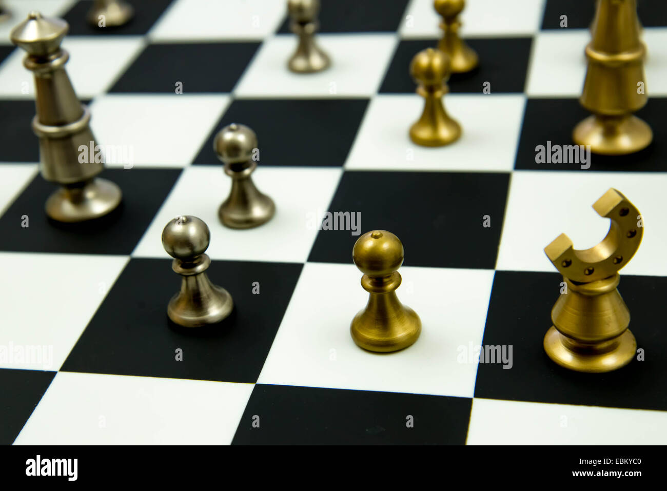 Classic chess game - pieces in play on chessboard Stock Photo - Alamy