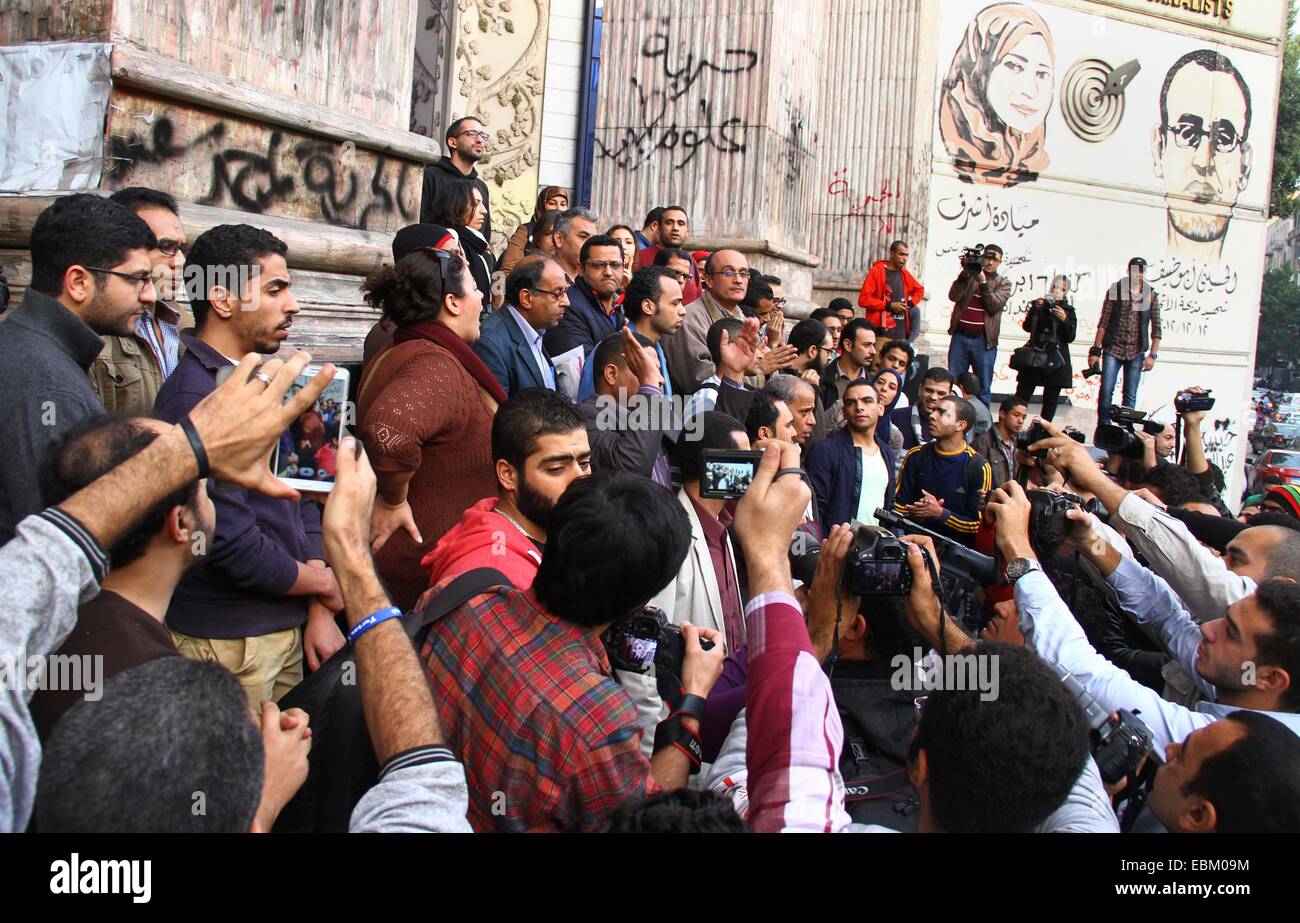 Cairo, Egypt. 2nd Dec, 2014. Egyptians chant slogans during a protest ...