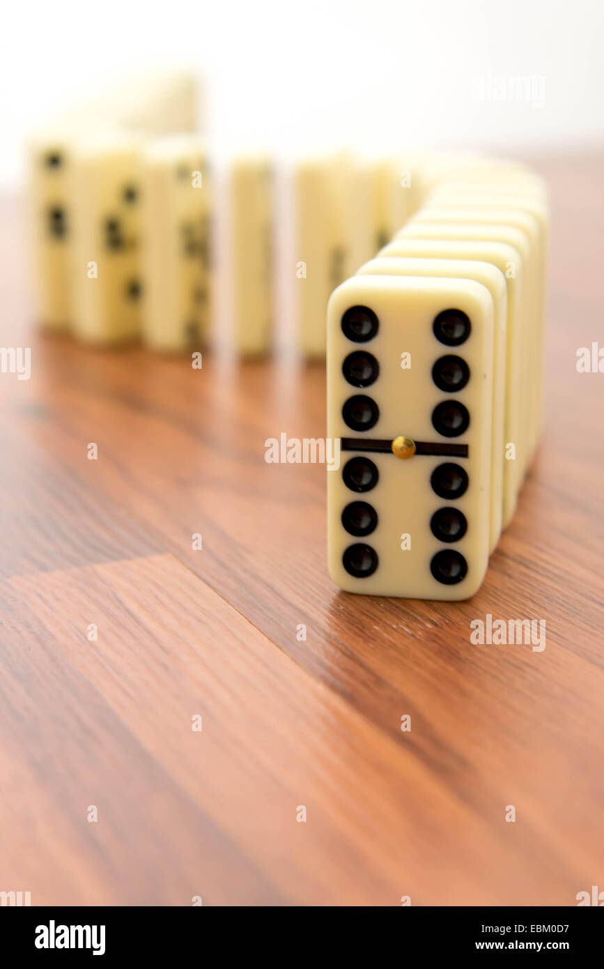 Domino tiles standing vertically in a line Stock Photo - Alamy Domino tiles standing vertically in a line Stock Photo - Alamy